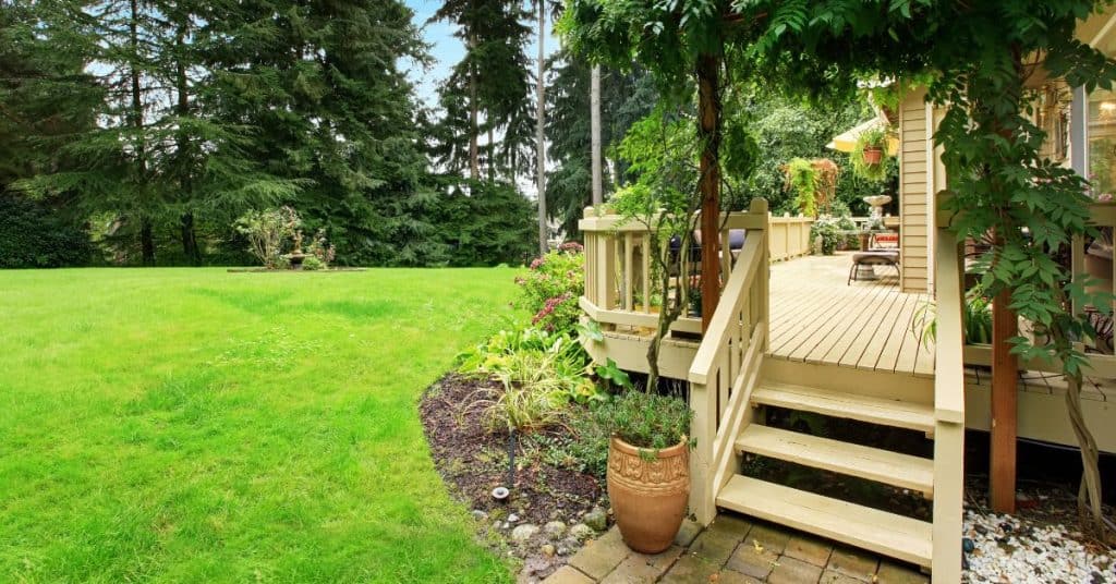 How to build deck stairs with a landing - craftingwithconcrete.com