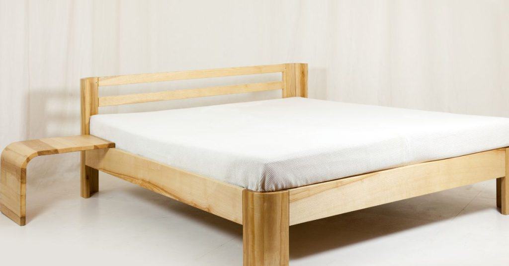 How to build a bed frame out of wood - craftingwithconcrete.com
