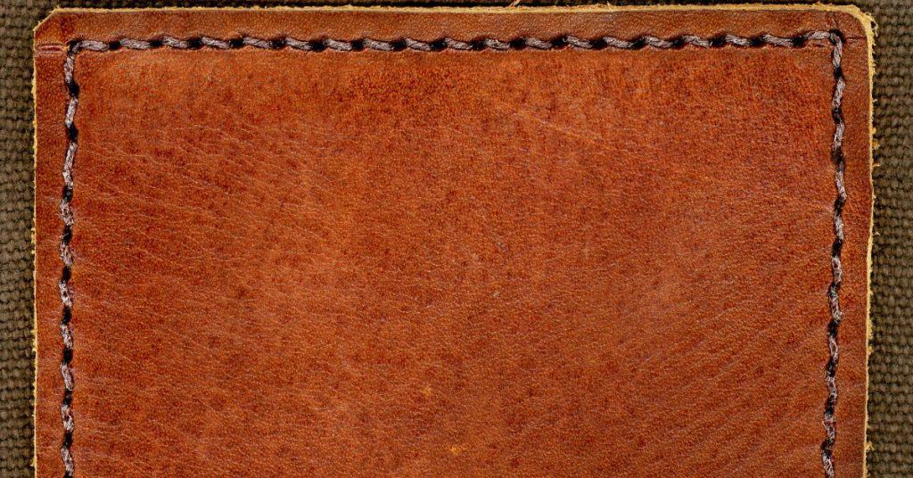 How to sew on a patch by hand - craftingwithconcrete.com