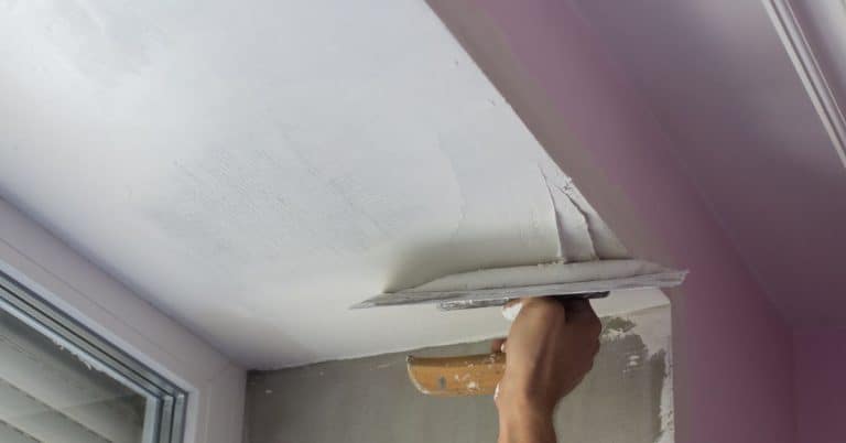 How to skim coat a wall for beginners - craftingwithconcrete.com