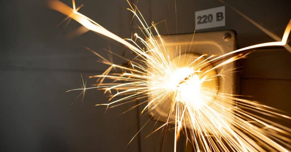 Plug Sparking Risks: Safety Tips & Solutions - craftingwithconcrete.com