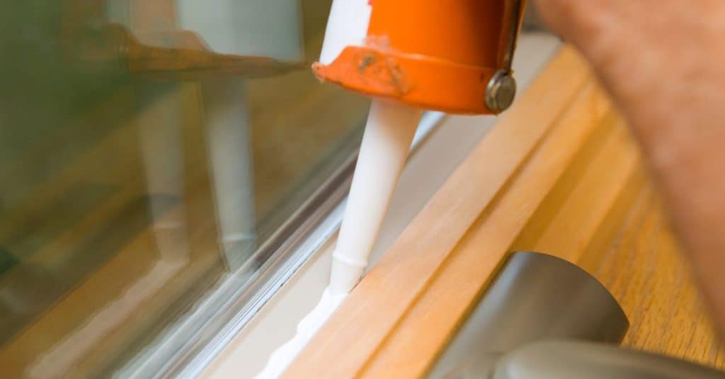 How to smooth caulk with finger - craftingwithconcrete.com