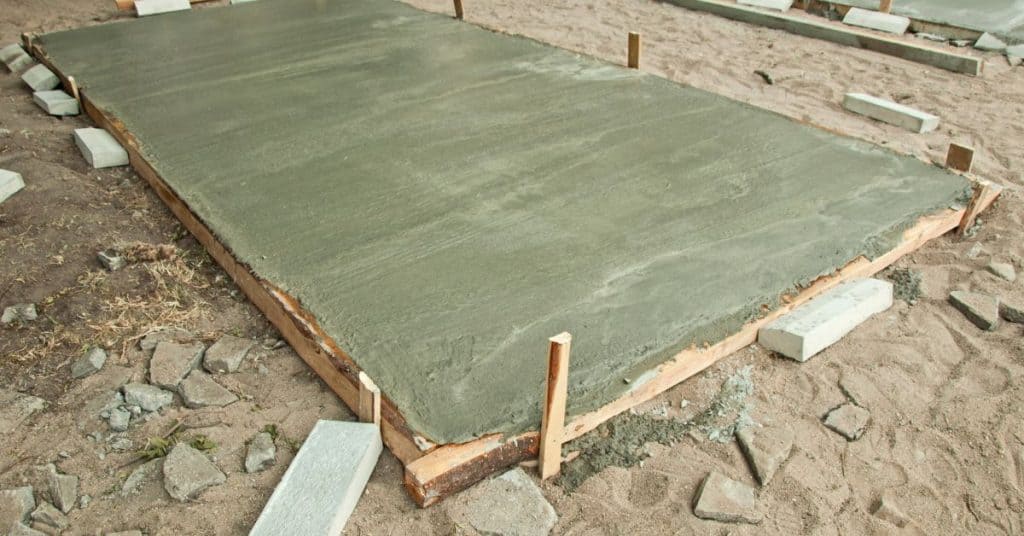 How to make a concrete slab foundation steps - craftingwithconcrete.com