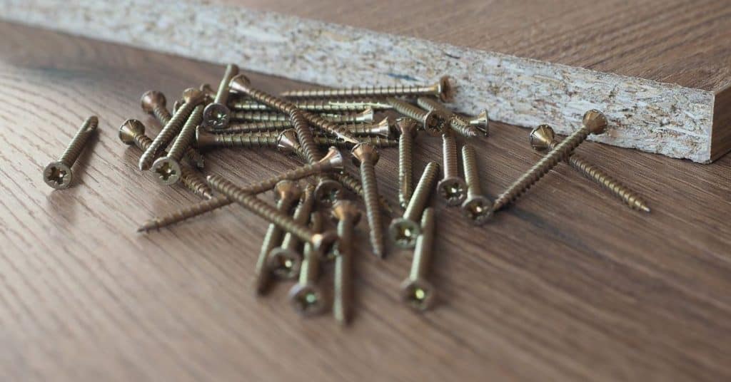 How to unscrew a tiny screw that is stuck - craftingwithconcrete.com