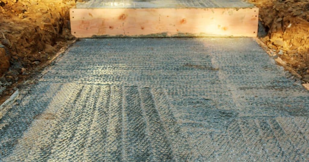 How is concrete poured on a slope? - craftingwithconcrete.com