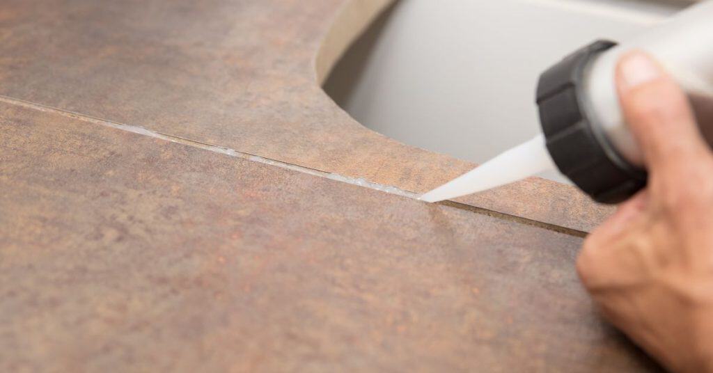 How to apply silicone caulking - craftingwithconcrete.com