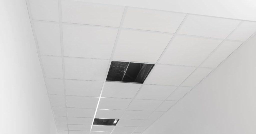 How to paint drop ceiling tiles - craftingwithconcrete.com