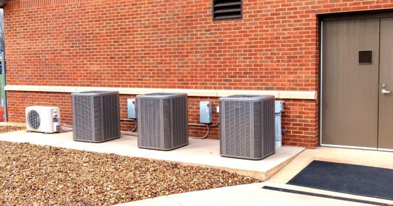 How to put rocks around ac unit - craftingwithconcrete.com