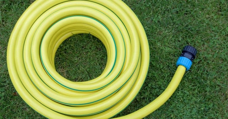 How to roll up a hose - craftingwithconcrete.com