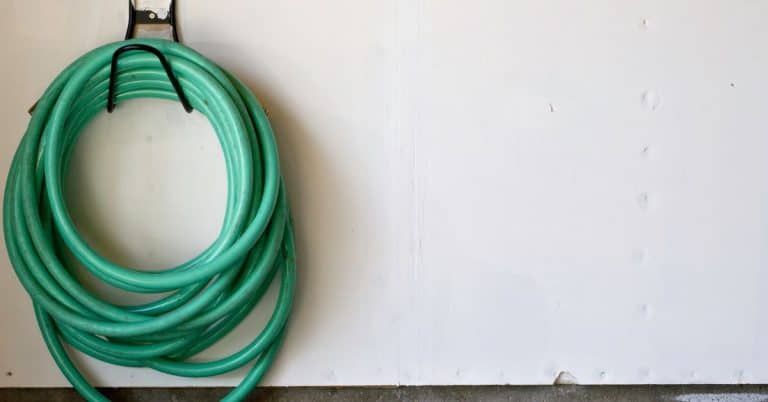 How to roll up a hose - craftingwithconcrete.com