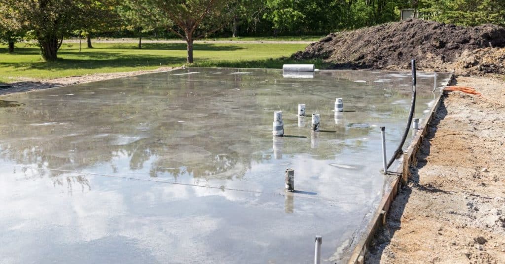 What happens with rain on wet concrete slab - craftingwithconcrete.com