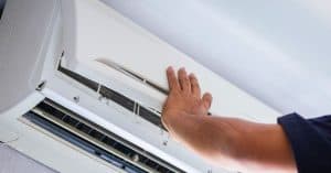 Running AC with Window Open: Effects Explained - craftingwithconcrete.com