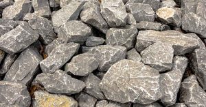 Rock Placement Guide to Prevent Slope Erosion - craftingwithconcrete.com