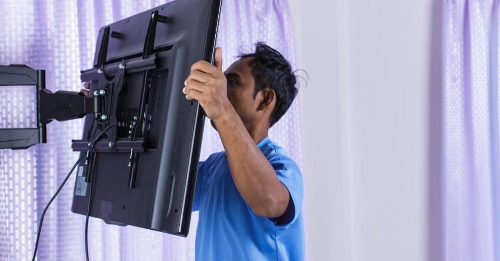 Remove Your TV from Wall Mount Easily - craftingwithconcrete.com