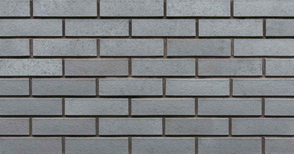 DIY Vertical Stamp Mix for Faux Brick Walls - craftingwithconcrete.com