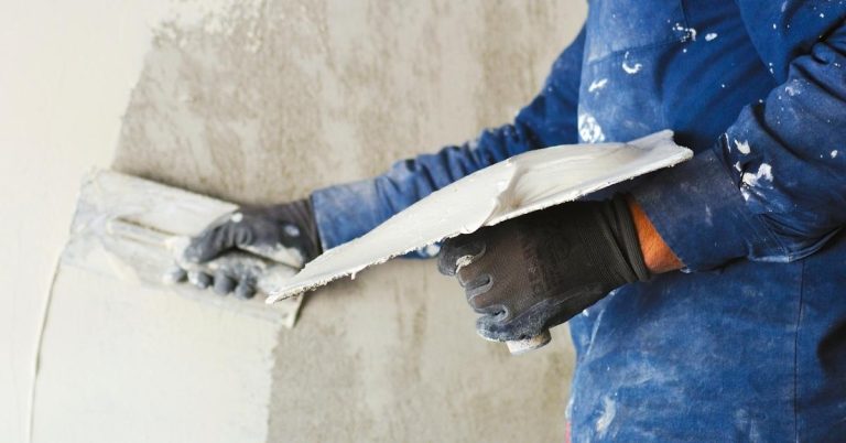Plaster Over Stone Fireplace for a Modern Look - craftingwithconcrete.com
