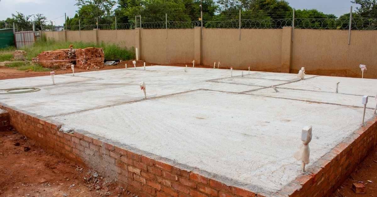Stucco at Garage Slab Edge: Preventing Wicking and Spalling at the Base ...